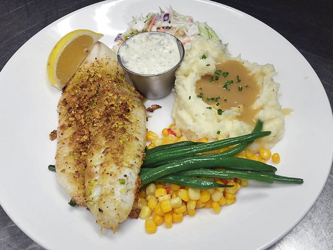 Pistachio-crusted walleye with mashed potatoes and seasonal vegetables&mdash;Minnesota's lake-to-plate philosophy at its most delicious.