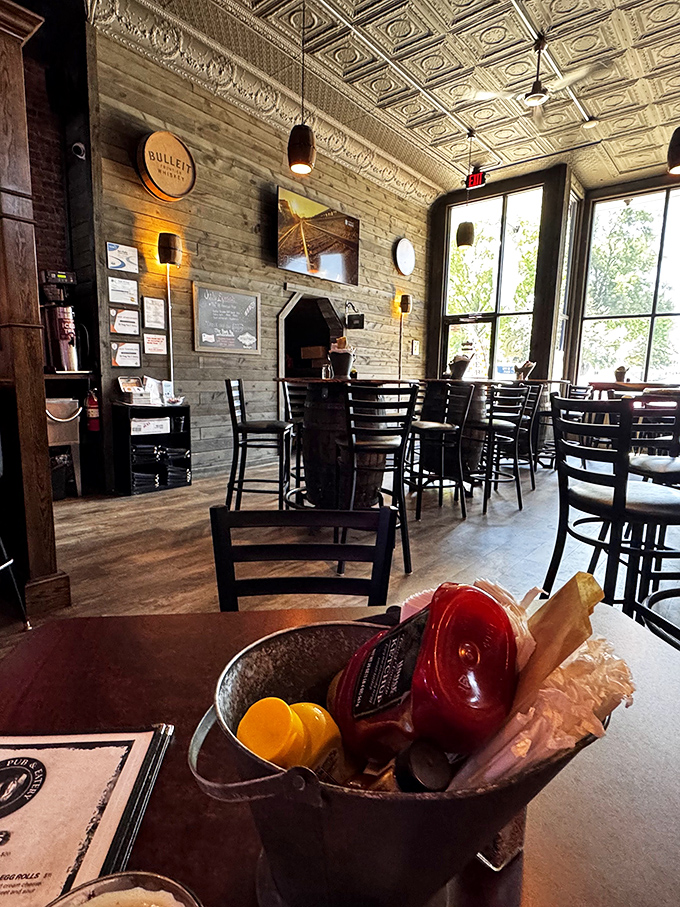At Pit Pony Pub, the pressed tin ceiling and warm wood tones create an atmosphere where comfort food meets comfortable prices.
