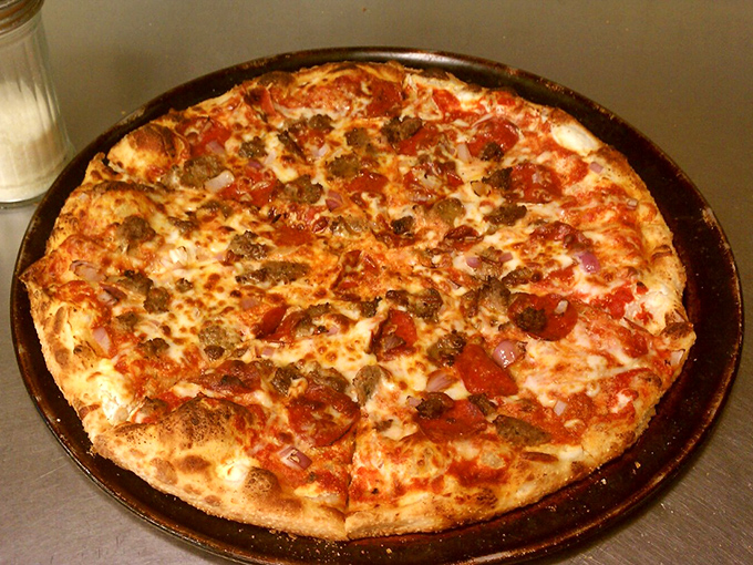 The holy trinity of pizza perfection: a crust with character, sauce with soul, and toppings that mean business.