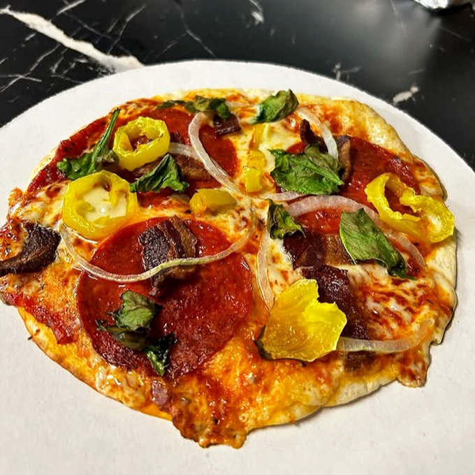 Pizza that proves you don't need to be in Naples to find happiness &ndash; just the right balance of cheese, toppings, and that essential char.