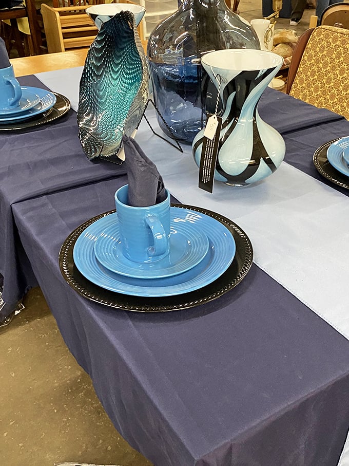 Table settings that would make Martha Stewart do a double-take &ndash; coastal blues against navy create unexpected elegance. 