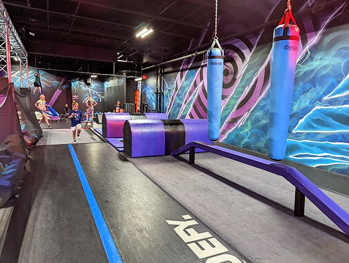 Kids bounce while parents' credit cards do the same. This play area provides the perfect energy release valve during marathon shopping sessions.