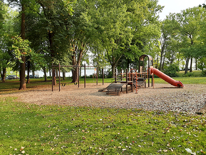 The lakeside playground where energy-filled grandkids can finally burn off those extra pancakes from breakfast. The slide's speed is directly proportional to how recently it rained.