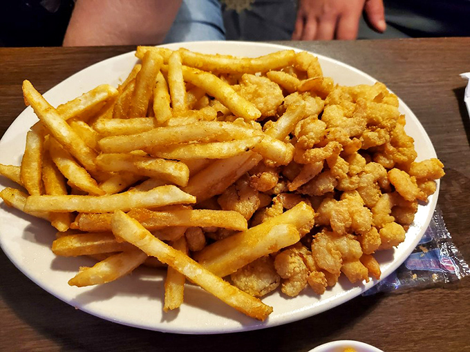 Golden-fried popcorn shrimp nestled against crispy fries&mdash;comfort food with coastal flair. Simple pleasures that remind us why we fell in love with seafood in the first place.