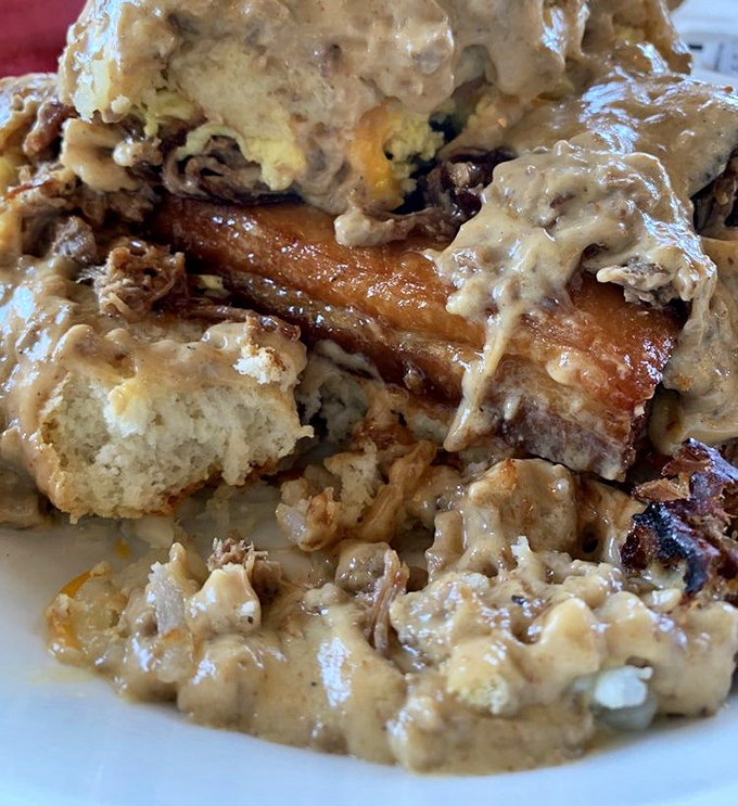 Biscuits and gravy elevated to an art form. That pork belly peeking through says, "You might need a nap after this, but it'll be worth it."