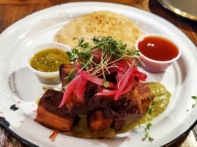 Pork belly bites that would make even vegetarians question their life choices. The pickled red onions cut through the richness like a flavor lifeguard.