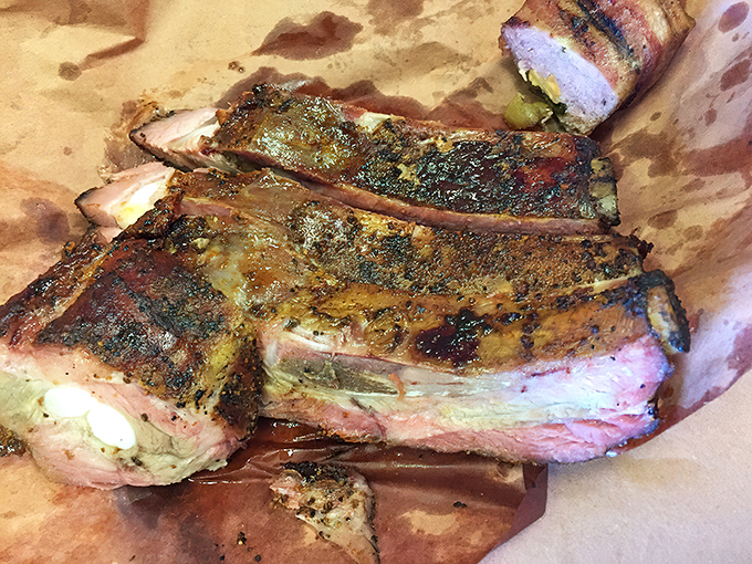 Ribs that cling to the bone just enough to give you something to work for, but surrender at the gentlest tug. That's barbecue poetry.