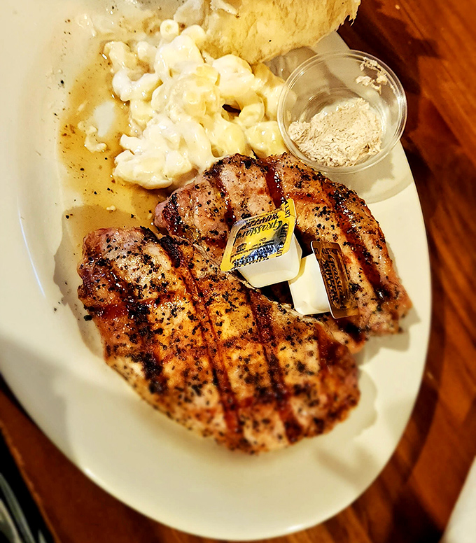 When pork chops are grilled this perfectly, you understand why some people have religious experiences in small-town Kansas restaurants.