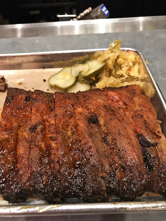 Smoke rings don't lie. These slices of pork tell the story of patience, craftsmanship, and the kind of flavor that makes you close your eyes and forget your table manners. 