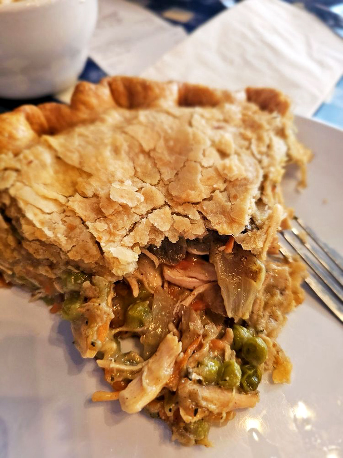 Not just a pot pie&mdash;a masterclass in comfort architecture. The golden crust barely containing a steamy medley of chicken and vegetables within.