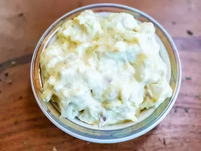 Potato salad that looks like someone's grandmother stood guard over it, refusing to let anyone add unnecessary frills.