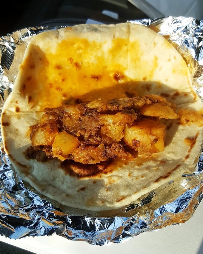 Golden cubes of potato nestled in a fresh tortilla. Simple ingredients transformed into something that makes you question why you ever ate cereal.