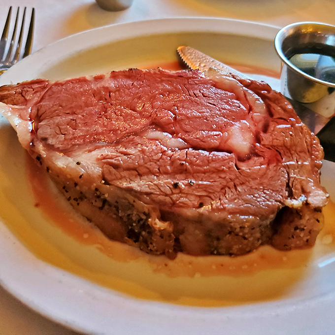 This prime rib isn't just dinner; it's a carnivore's dream that practically begs you to cancel tomorrow's plans and order seconds.