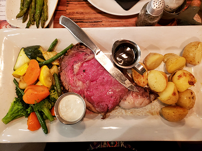 Prime rib so perfectly cooked it deserves its own Instagram account. The pink center whispers, "Your diet starts tomorrow."