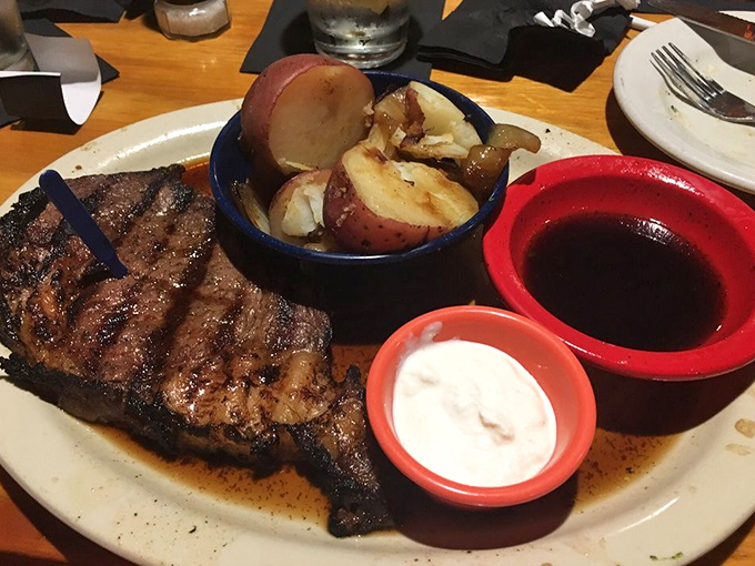 The prime rib arrives like a carnivore's dream &ndash; a generous cut accompanied by potatoes and the kind of jus that demands to be sopped up.