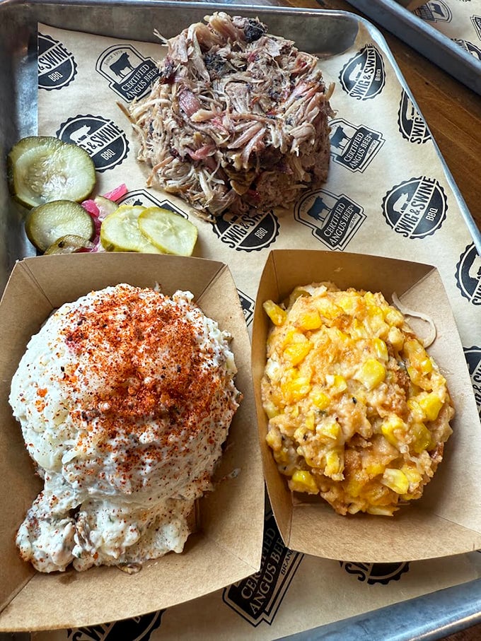 Pulled pork so tender it practically pulled itself, served with sides that don't know the meaning of "afterthought."