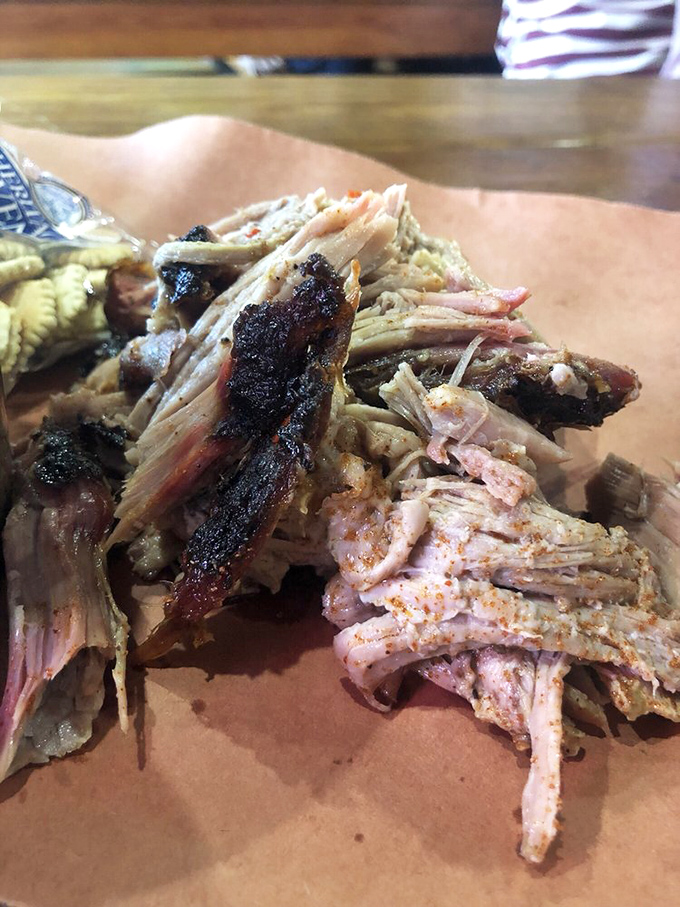 Pulled pork that's had a proper introduction to smoke and spice. Each strand tells a story of patience, craftsmanship, and the magic of low-and-slow cooking.