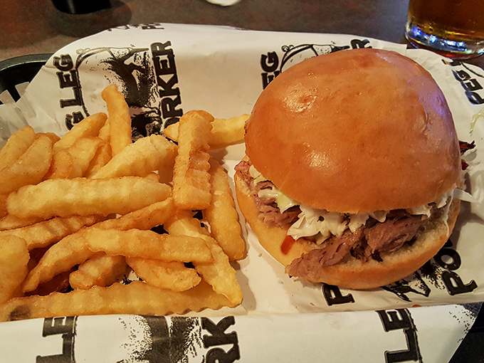 A pulled pork sandwich that doesn't need Instagram filters&mdash;just your immediate attention. The perfect ratio of meat to bun to slaw.