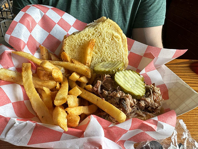 Golden fries, buttery Texas toast, and a heap of pulled pork&mdash;this tray contains more happiness than most people experience in an entire week.