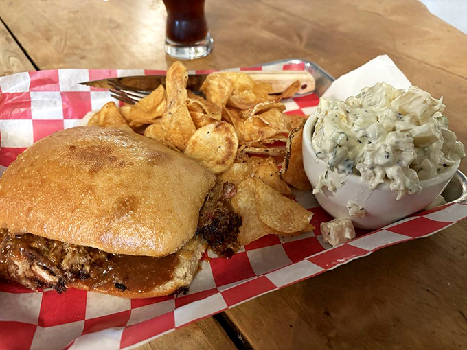 The pulled pork sandwich arrives with house-made chips and potato salad&mdash;a trio that makes you wonder why you'd ever eat anywhere else.