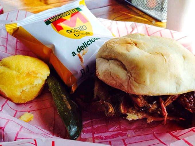 The pulled pork sandwich arrives with cornbread and chips&mdash;a holy trinity of comfort that makes you wonder why you'd eat anything else.