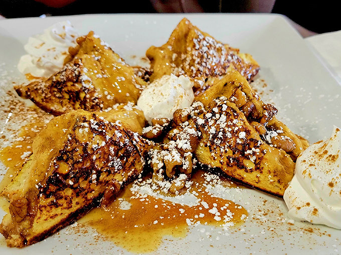 French toast that's having an identity crisis as pumpkin pie. Golden-brown perfection dusted with powdered sugar and cinnamon &ndash; autumn on a plate.