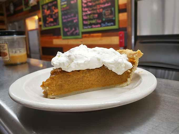 Pumpkin pie crowned with whipped cream&mdash;autumn captured in a single slice that tastes like Thanksgiving decided to show up early.