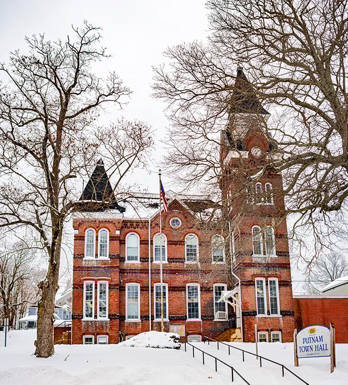 Putnam's Town Hall stands proudly in winter white, a red-brick testament to when public buildings were built to inspire, not just house bureaucracy.