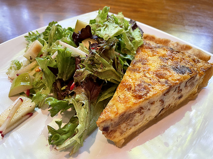 Quiche that puts ordinary breakfast to shame. Paired with a fresh side salad, it's the brunch equivalent of wearing silk pajamas on a Tuesday.