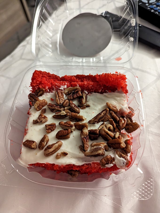 Red velvet cake with cream cheese frosting and pecans&mdash;because after conquering a mountain of barbecue, you deserve a dessert that's equally memorable. 