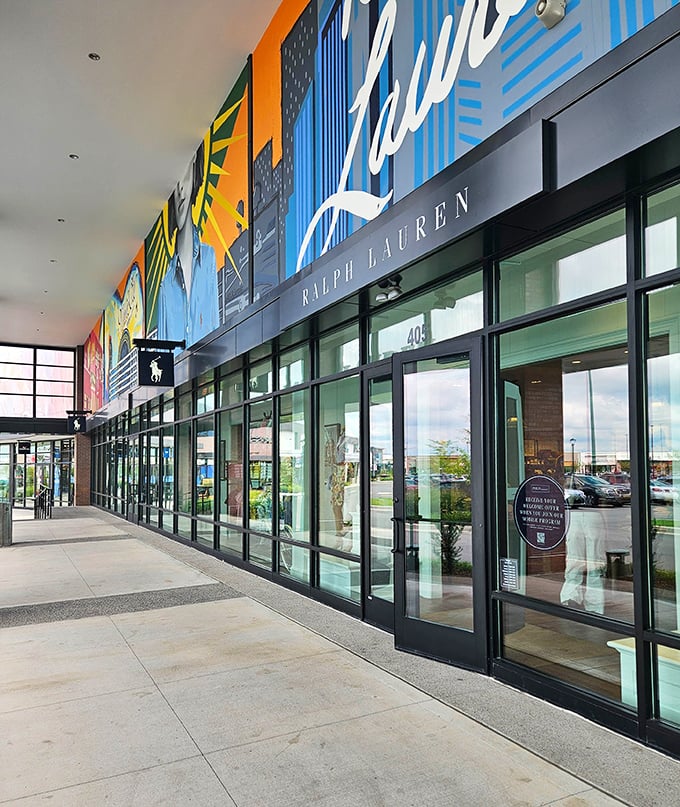 Ralph Lauren without the Ralph Lauren prices. The colorful Nashville-themed artwork above adds local flair to this premium shopping experience.