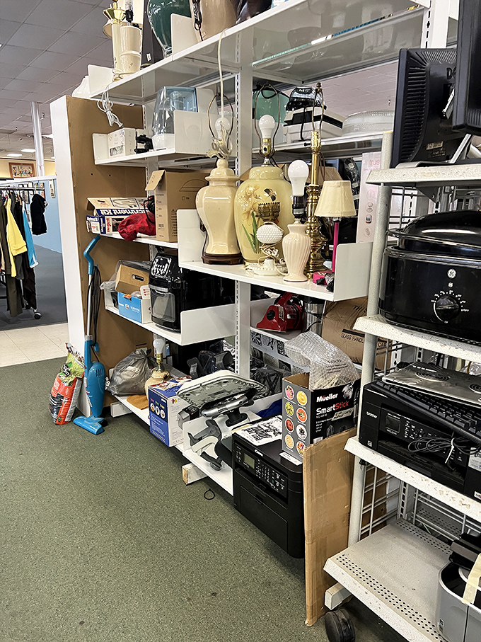 Shelf after shelf of household possibilities! From vintage lamps to kitchen appliances still in boxes, it's like a time capsule of American domesticity.
