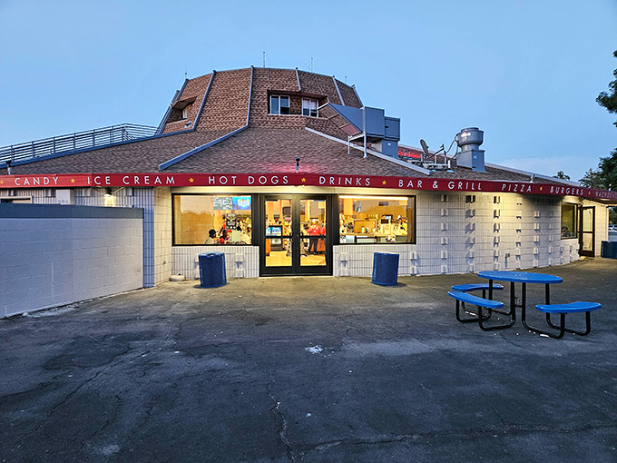 The retro-cool concession building beckons with promises of hot dogs, candy, and ice cream &ndash; the essential fuel for any proper drive-in experience.