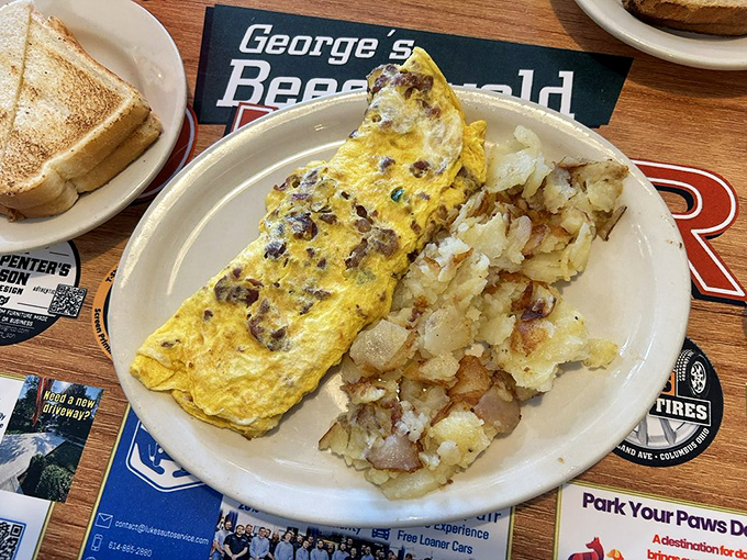 This omelet doesn't just contain ingredients&mdash;it showcases them, alongside home fries that could make a potato farmer weep with pride.