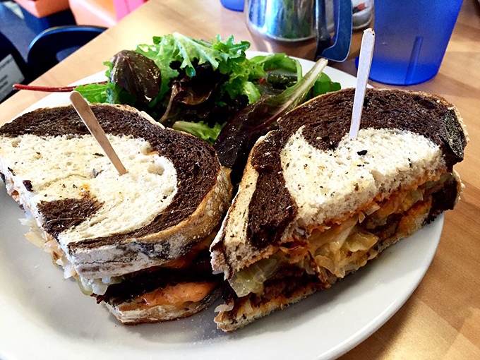 The marble rye sandwich, stacked higher than some LA apartment buildings, proves that sometimes the classics need no improvement.