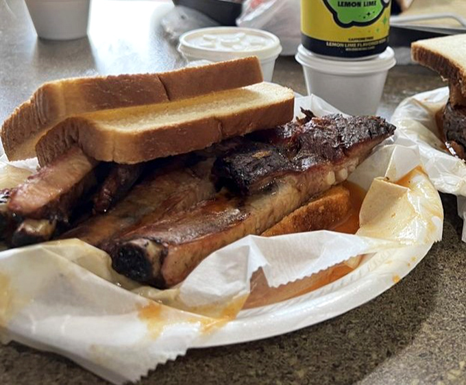 When ribs meet white bread, magical things happen that fancy restaurants can't replicate with all their pretension.