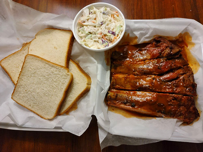 White bread: not just a sandwich foundation but a strategic sauce-delivery system. Paired with ribs and slaw, it's the Alabama trinity.
