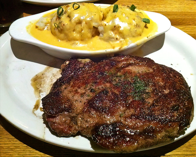 A ribeye with a sear so perfect it deserves its own Instagram account, paired with cheesy potato casserole that grandma would approve of.
