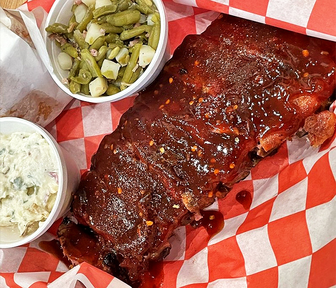 These ribs aren't just glazed&mdash;they're lacquered with a sauce so hypnotic it could convince vegetarians to reconsider their life choices.