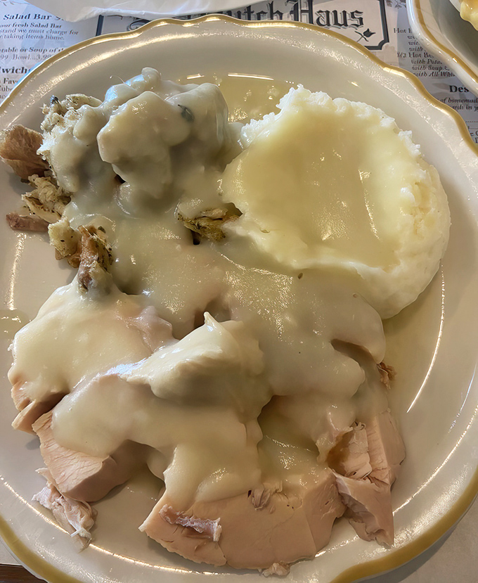Turkey dinner with all the fixings that makes you wonder why we limit Thanksgiving to just one day a year.