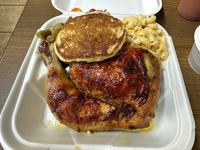 Rotisserie chicken with a golden-brown skin that crackles with each bite, paired with mac and cheese that puts childhood memories to shame.