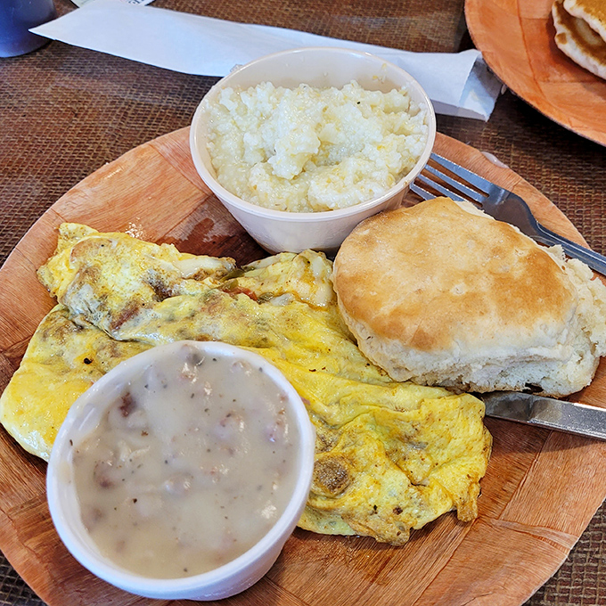 The perfect marriage: fluffy omelet meets cloud-like biscuit with creamy gravy as matchmaker. Some relationships are just meant to be.