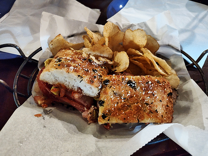 That toasted focaccia barely contains the Italian meats and melted cheese trying to escape from this magnificent sub.