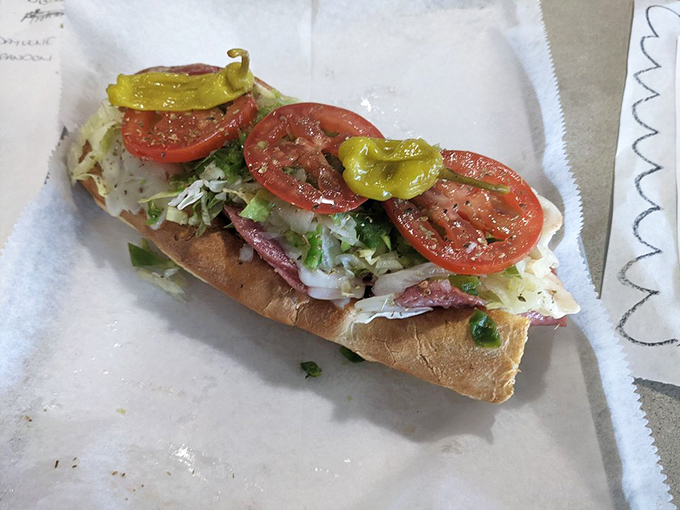 This isn't just a sandwich&mdash;it's architecture. Layers of meat, fresh tomatoes, and those game-changing banana peppers create the perfect bite.