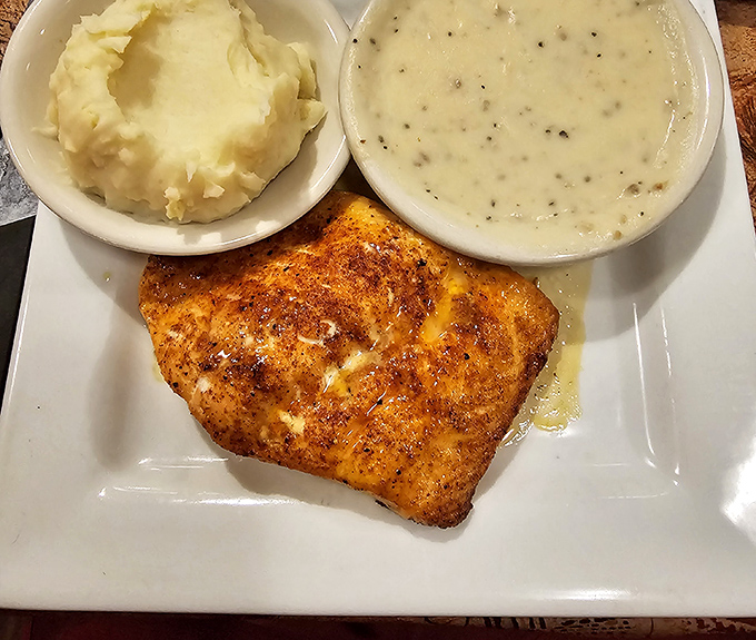 This perfectly seasoned fish with creamy sides isn't just dinner &ndash; it's proof that Missouri knows its way around seafood too.