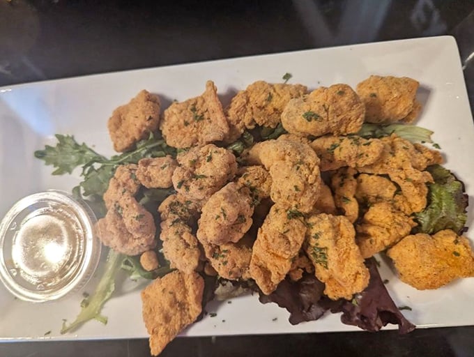 Crispy-skinned salmon perched atop a bed of mixed greens&mdash;the dish that launches hundred-mile road trips and zero regrets.