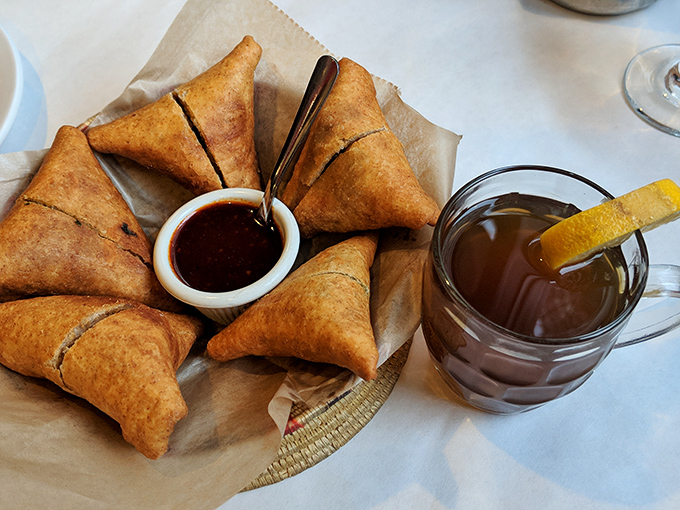 Triangles of joy that make mozzarella sticks weep with inadequacy. These sambussas are crispy on the outside, savory on the inside, and perfect for dipping.