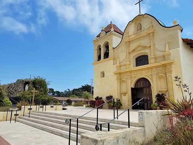 The historic San Carlos Cathedral stands as a sun-washed reminder of Monterey's Spanish heritage, its fa&ccedil;ade glowing like California gold in the afternoon light.