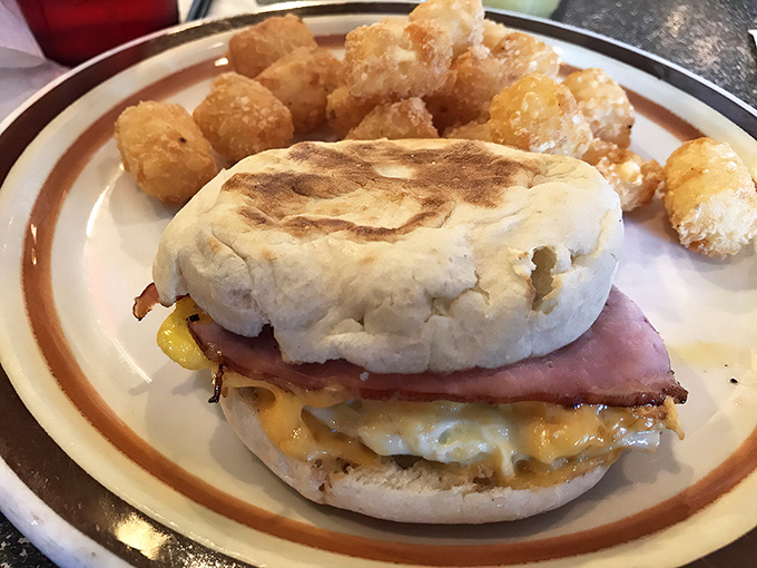 This breakfast sandwich with golden tater tots is the morning equivalent of finding front-row concert tickets in your mailbox.