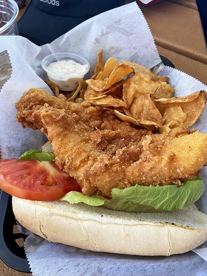 A sandwich that requires both hands and possibly a nap afterward. The kind of meal that makes you cancel afternoon plans in favor of lakeside lounging.